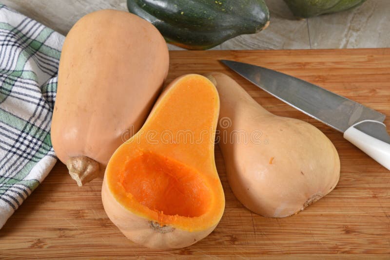 Sliced Raw Butternut Squash Stock Photo - Image of wooden, golden ...
