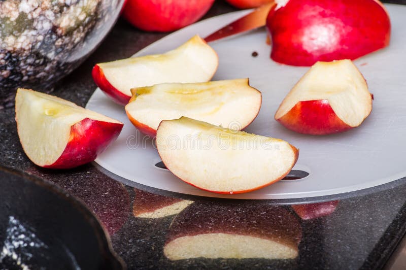 Sliced Red Apples on Cutting Board Stock Image - Image of food ...