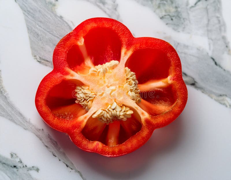 A Sliced Red Bell Pepper Aligned Precisely in a Circular Fan Pattern on ...