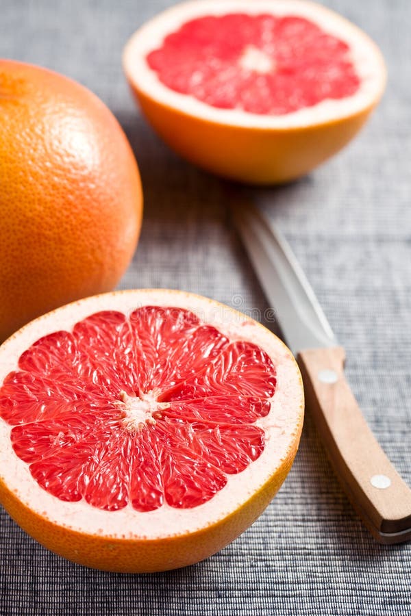 Sliced red grapefruit stock photo. Image of grapefruit - 17679418