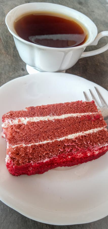 Sliced Red Velvet Cake on a White Plate Served with a Cup of Coffee ...