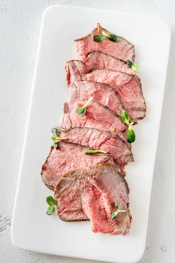 Sliced roast beef stock photo. Image of meat, restaurant - 340719928