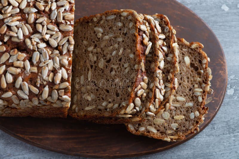 Sliced Rye Bread on Cutting Board. Whole Grain Rye Bread with Seeds ...