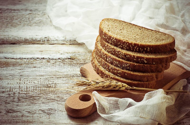 Sliced Rye Bread with Sesame Seeds Stock Image - Image of loaf, toned ...