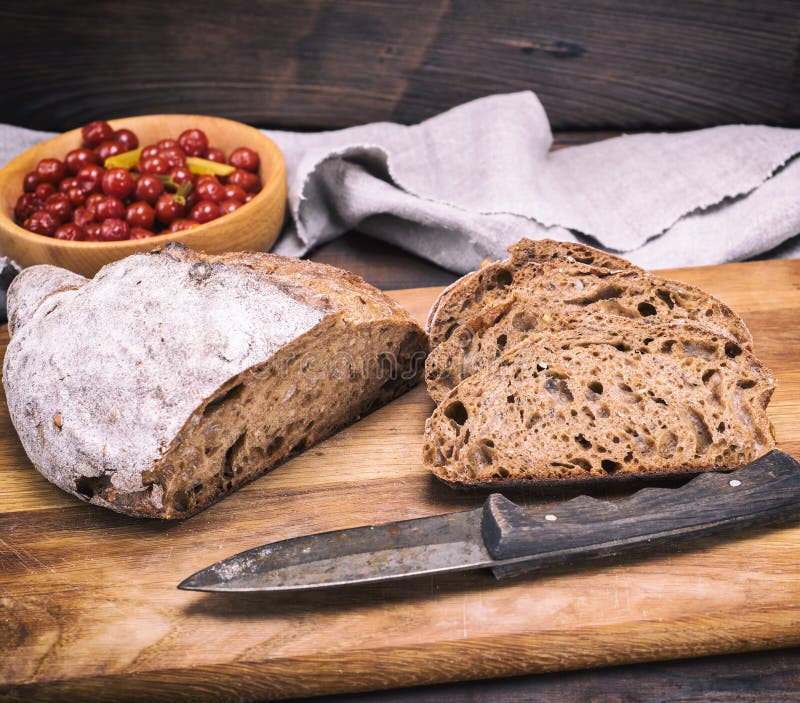 Sliced Rye Bread on a Wooden Board Stock Photo - Image of board, wheat ...