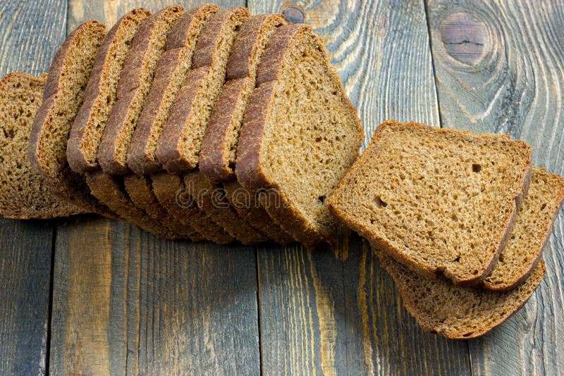 Sliced Rye Bread on a Wooden Table Stock Image - Image of wood ...