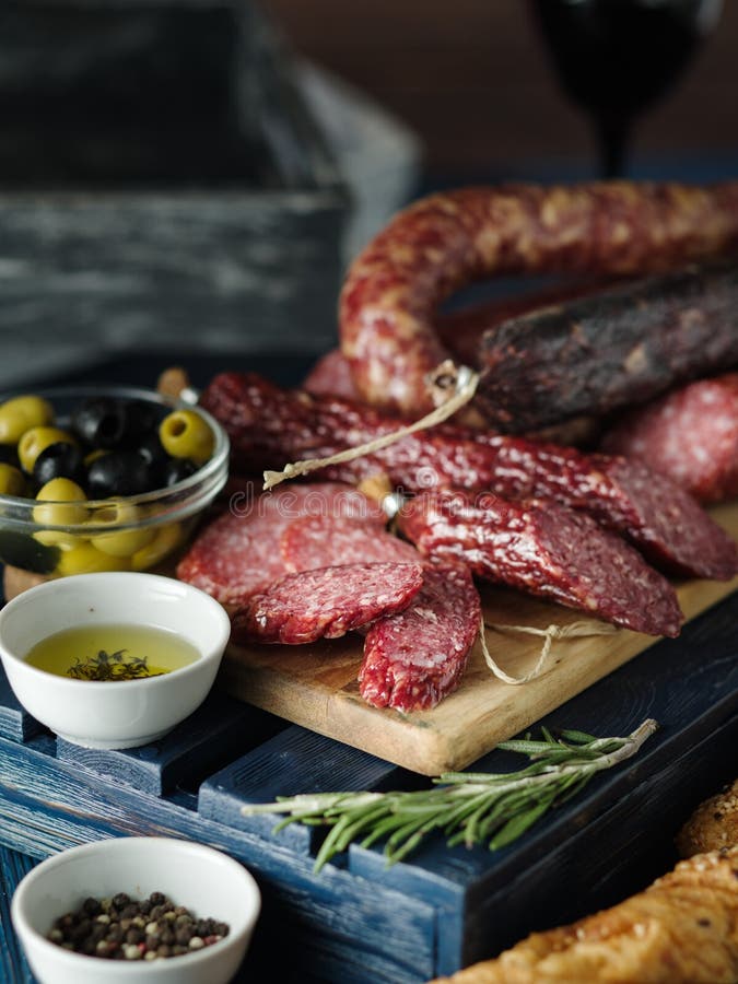 Sliced Salami in Rustic Style Stock Photo - Image of lunch, buffet ...