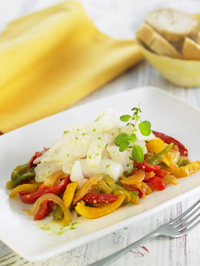 Sliced Salt-cod on a Bed of Piperade Stock Photo - Image of style ...