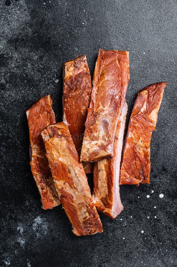 Sliced Smoked BBQ Pork Ribs. Black Background Stock Photo - Image of ...