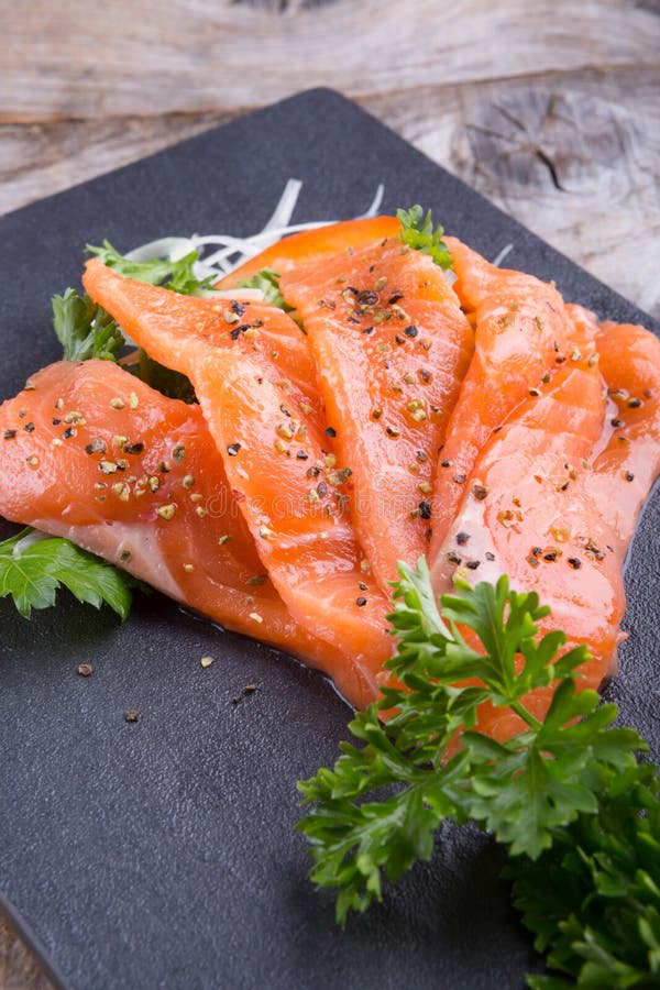 Sliced smoked salmon stock photo. Image of leek, cold - 72898066