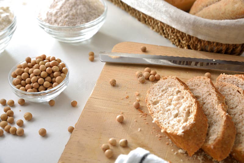 Sliced Soy Bread on Cutting Board on Kitchen Bench Stock Photo - Image ...