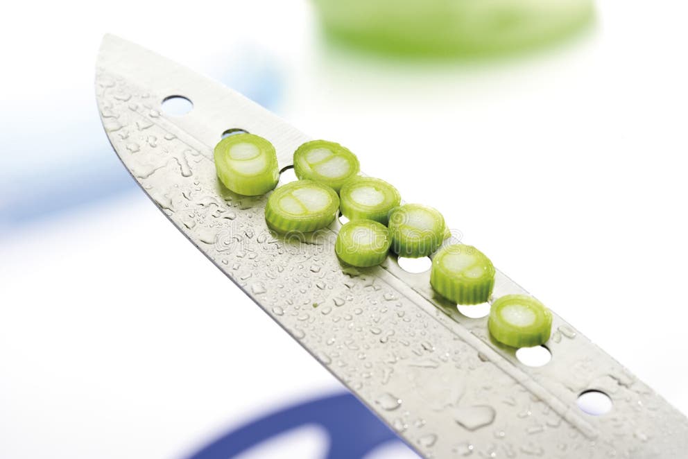 Sliced Spring Onions on Knife Stock Photo - Image of drop, crop: 50500678