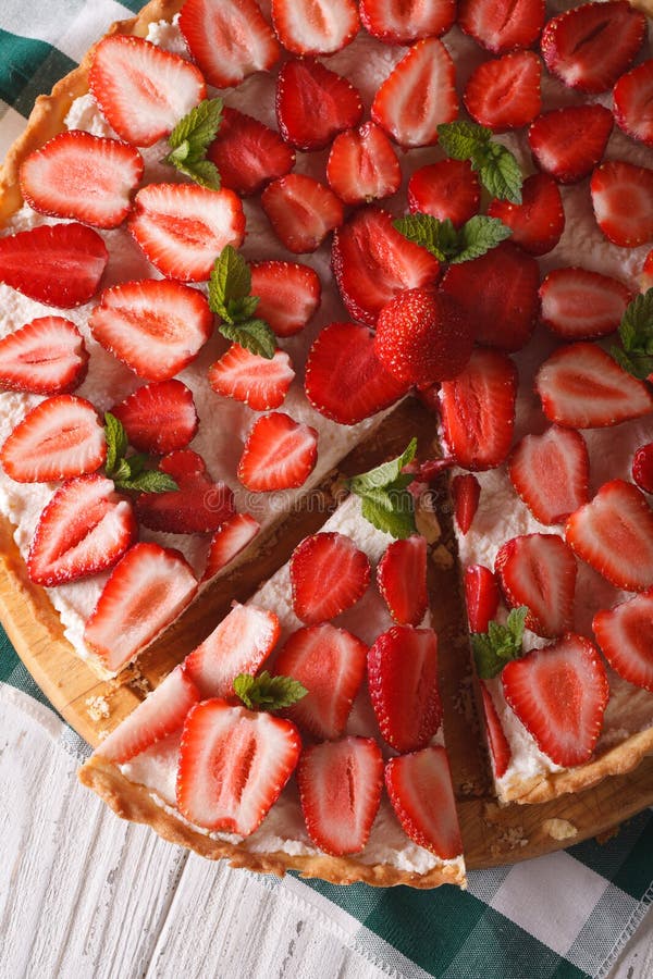 Sliced Strawberry Tart Closeup. Vertical Top View Stock Photo - Image ... Sliced Strawberry Tart Closeup. Vertical Top View Stock Photo - Image ...