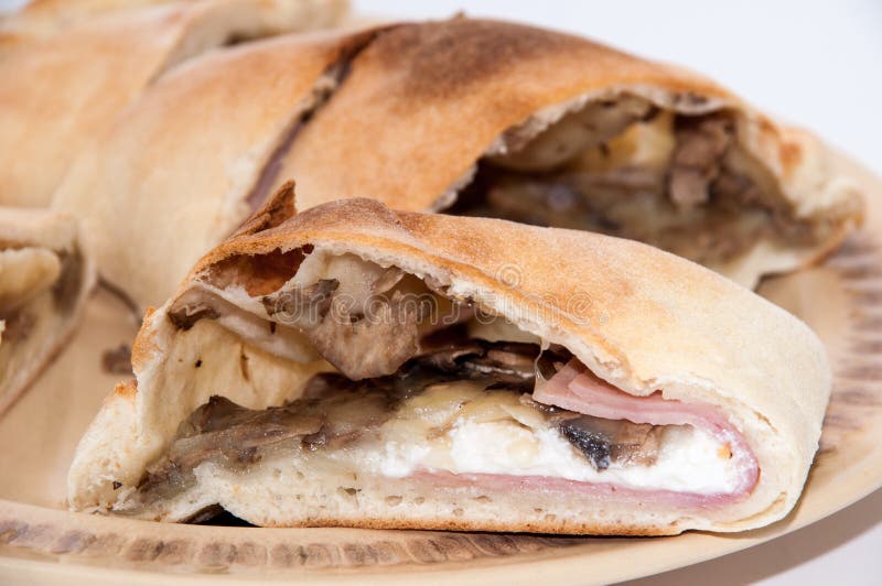 Sliced Stuffed Pirogue on the Plate Stock Image - Image of closed ...