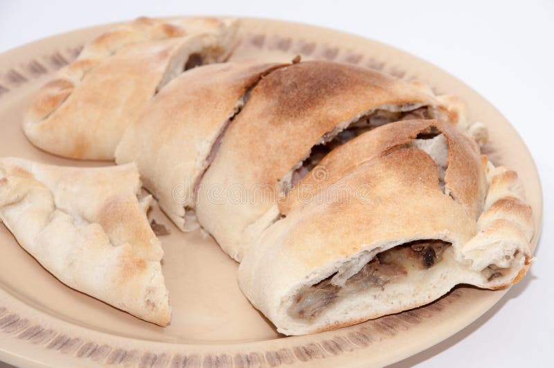 Sliced Stuffed Pirogue on the Plate Stock Image - Image of bakery ...