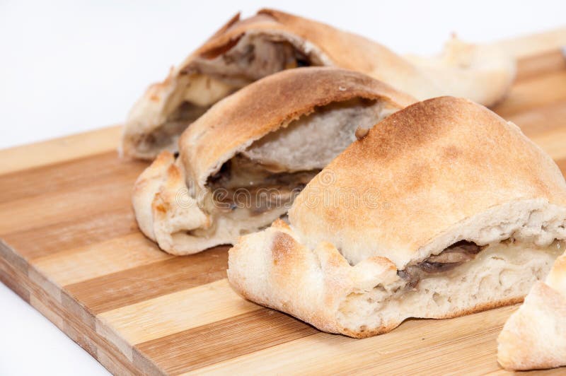 Sliced Stuffed Pirogue on the Wooden Board Stock Photo - Image of beige ...