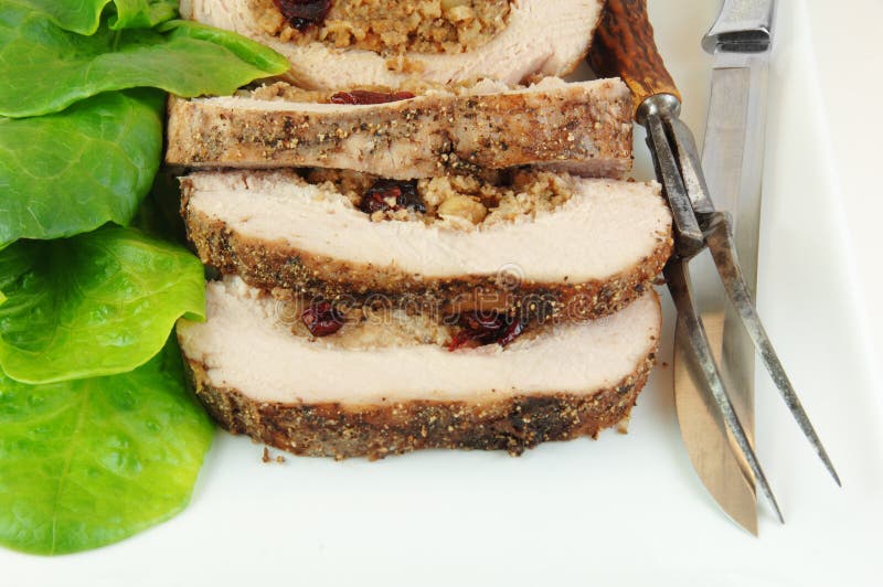 Sliced Stuffed Pork Roast stock image. Image of roast - 12962541