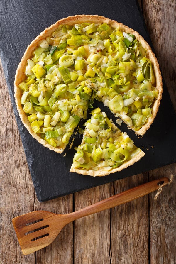 Sliced Tart with Leek and Cheese Close-up. Vertical Top View Stock ...