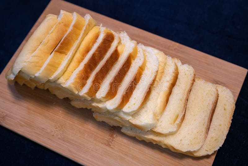 Sliced Toast on the Cutting Board. Stock Image - Image of wood, yellow ...
