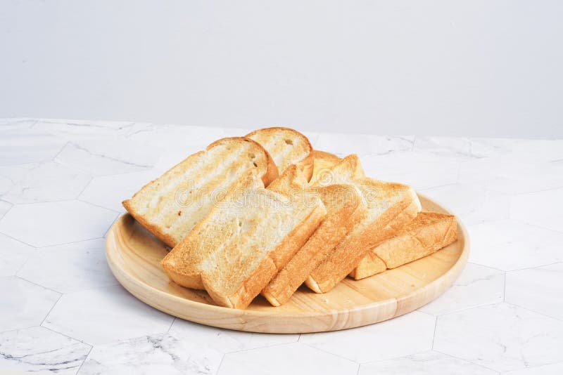 Sliced Toast on a Wooden Plate. Stock Photo - Image of table, closeup ...