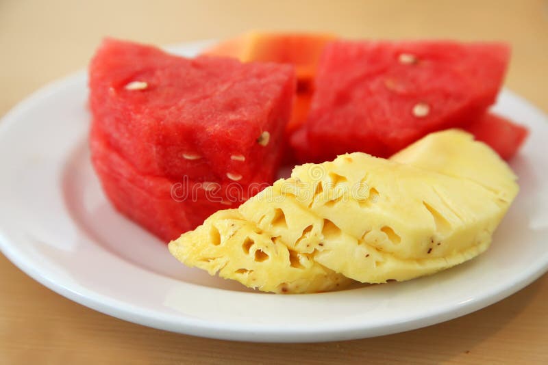 Sliced tropical fruits stock photo. Image of dessert - 10777722