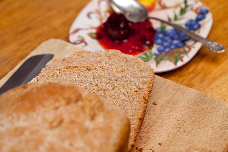 Sliced wheat bread and jam stock photo. Image of organic - 22240014