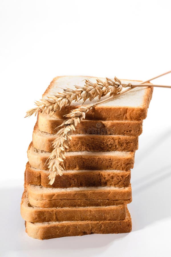 Sliced Wheat Bread and Wheat on a White Background Stock Photo - Image ...