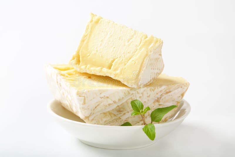 Sliced white rind cheese stock image. Image of slice - 62156099