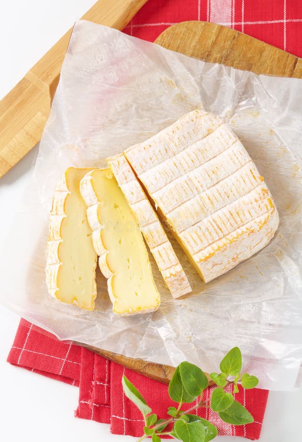 Sliced white rind cheese stock image. Image of gourmet - 62156167
