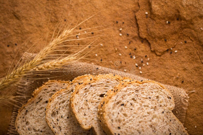 Sliced Whole Wheat Bread on Dark Background. Stock Photo - Image of ...