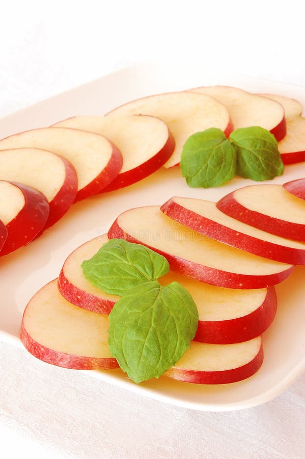 Slices of apple stock image. Image of fruits, green, leaves - 9516479