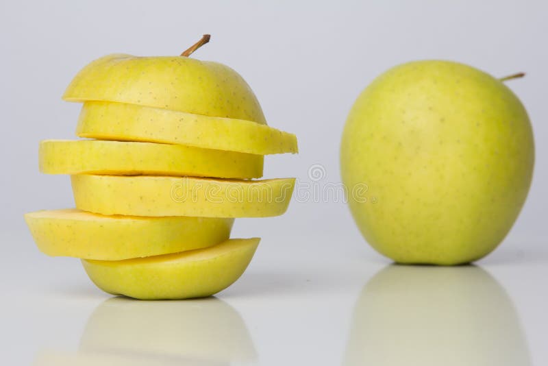 Slices of Apple and One Whole Apple Stock Image - Image of apple, fresh ...