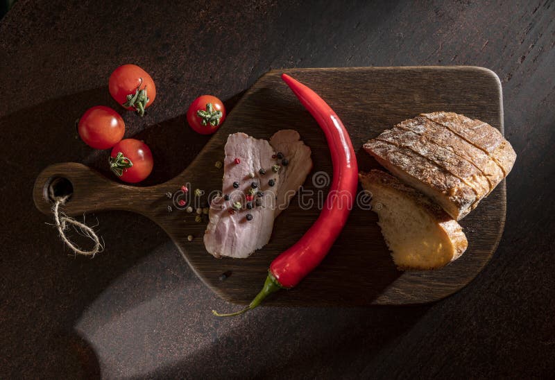 Slices of Bacon, Bread, Tomatoes, Pepper on a Wooden Board Stock Image ...
