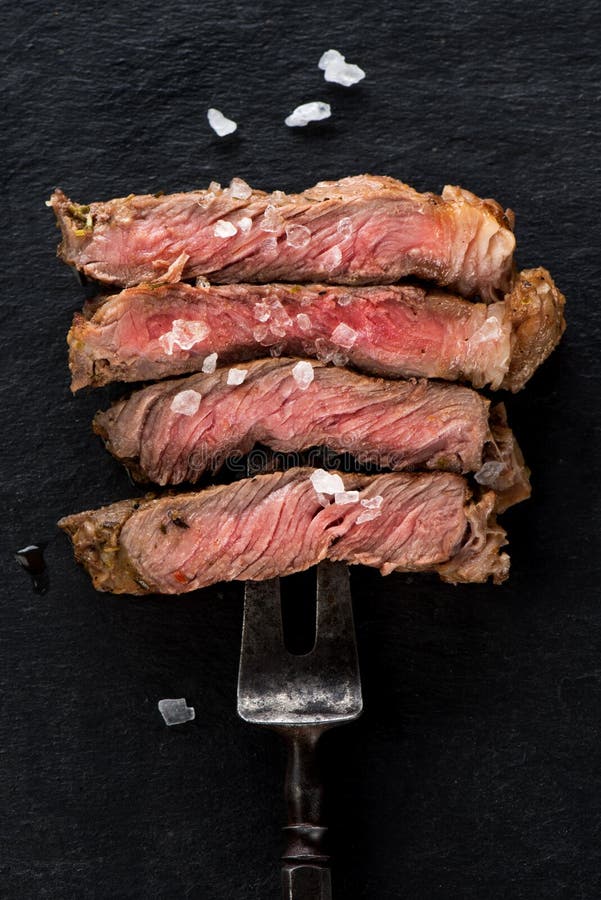 Slices Beef Steak Ribeye On Meat Fork Stock Photo - Image of food ... Slices Beef Steak Ribeye On Meat Fork Stock Photo - Image of food ...