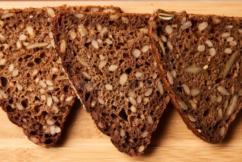 Slices of black rye bread stock image. Image of cutting - 121006099