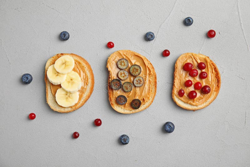 Slices of Bread with Different Toppings on Grey , Flat Lay Stock Photo ...