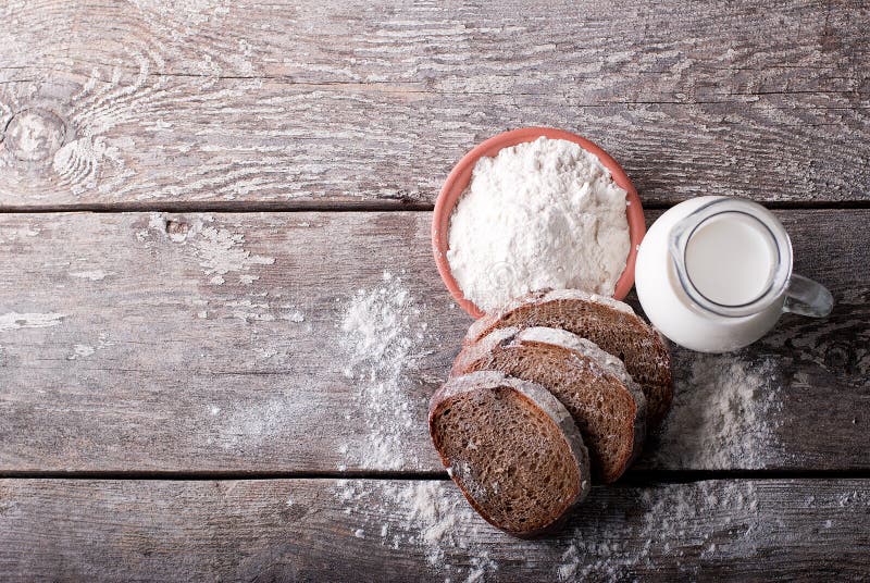 Slices of bread with flour stock photo. Image of brown - 68570046