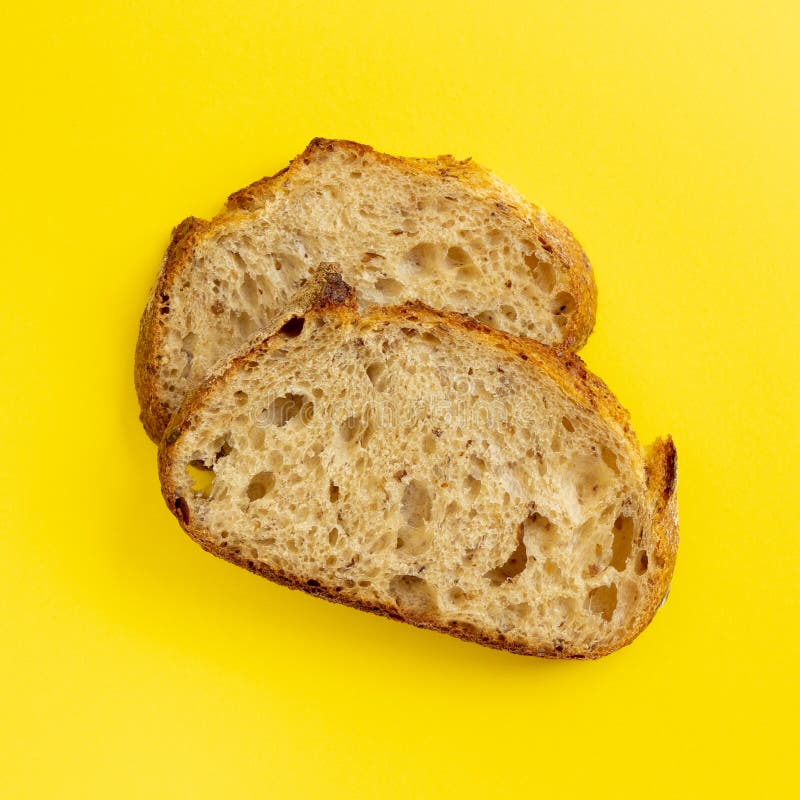 Slices Bread Isolated on a Yellow Background. Flat Lay Stock Photo ...