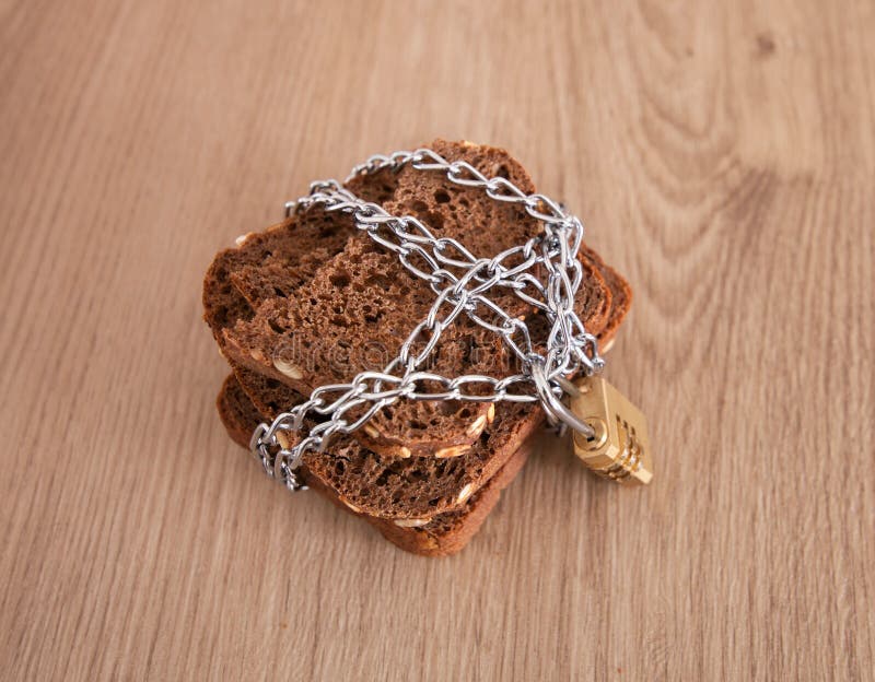 Slices of Bread Locked by Chains Stock Photo - Image of still ...