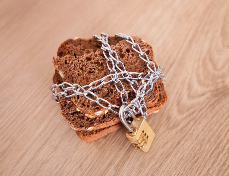Slices of Bread Locked by Chains Stock Image - Image of golden, house ...