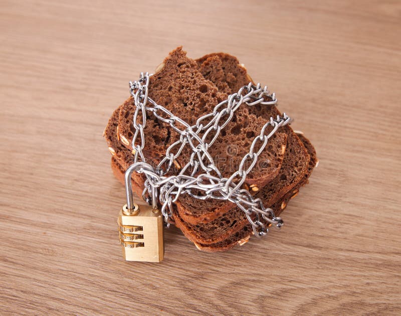 Slices of Bread Locked by Chains Stock Photo - Image of frozen, small ...
