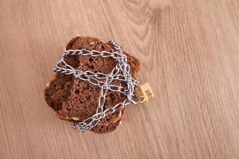 Slices of Bread Locked by Chains Stock Photo - Image of frozen, asset ...