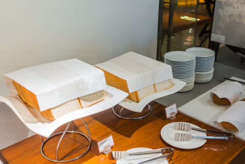 Slices of Bread on Table in Buffet . Stock Photo - Image of appetite ...