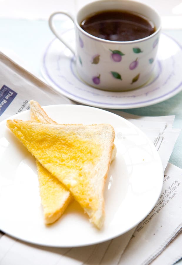 Slices of Buttered Toast Served with a Cup of Hot Stock Image - Image ...