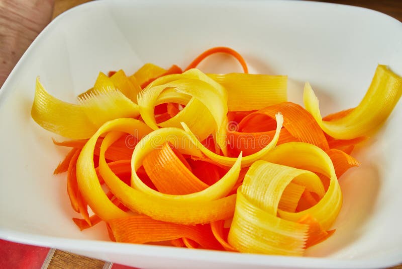 Slices of Carrots of Three Colors, Cut into Strips in Glass Bowl Stock ...