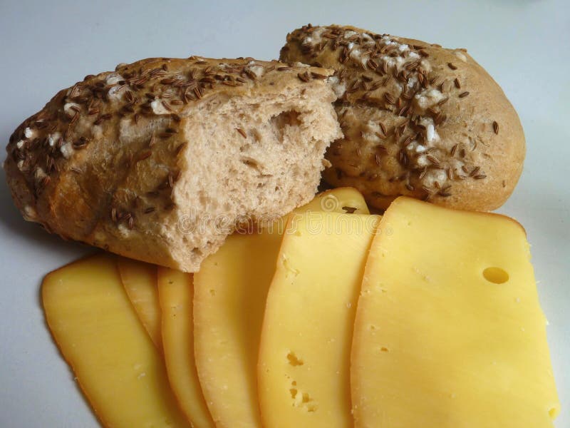 Slices of Cheese with Piece of Bread Stock Image - Image of brown ...