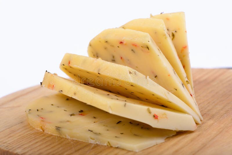 Slices of Cheese with Spices Stock Image - Image of slice, cheese ...