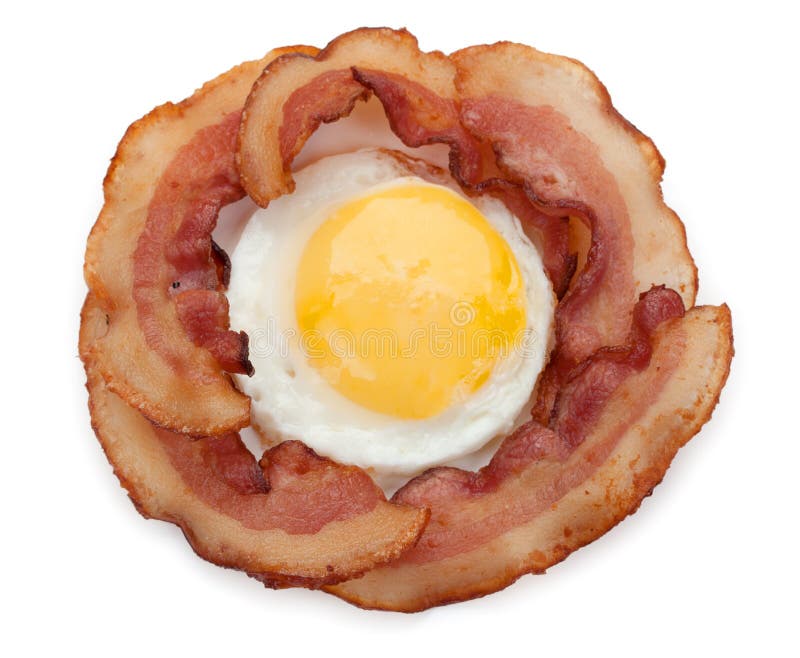Slices of Cooked Bacon with Fried Egg Isolated on a White Background ...