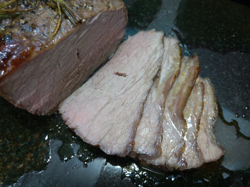 Slices of cooked beef meat stock image. Image of kitchen - 104405169