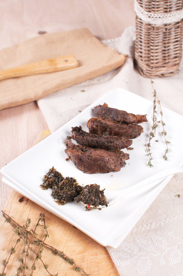 Slices of Cooked Duck Breast with Herbs Sauce Stock Photo - Image of ...